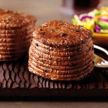 Pepper-Ancho Rubbed Ribeye Filets with Mango Slaw